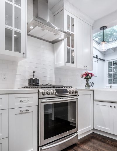 Kitchen Remodeled Studio City with Barn Door Pantry | Eden Builders