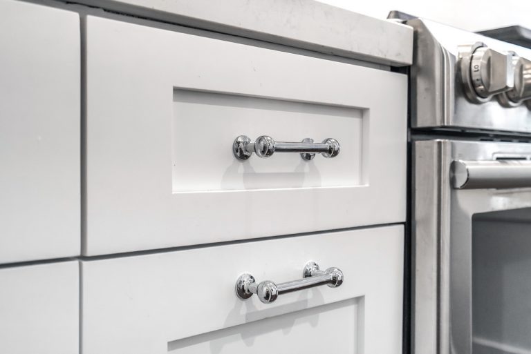 white-kitchen-cabinet-steel-pulls | Eden Builders