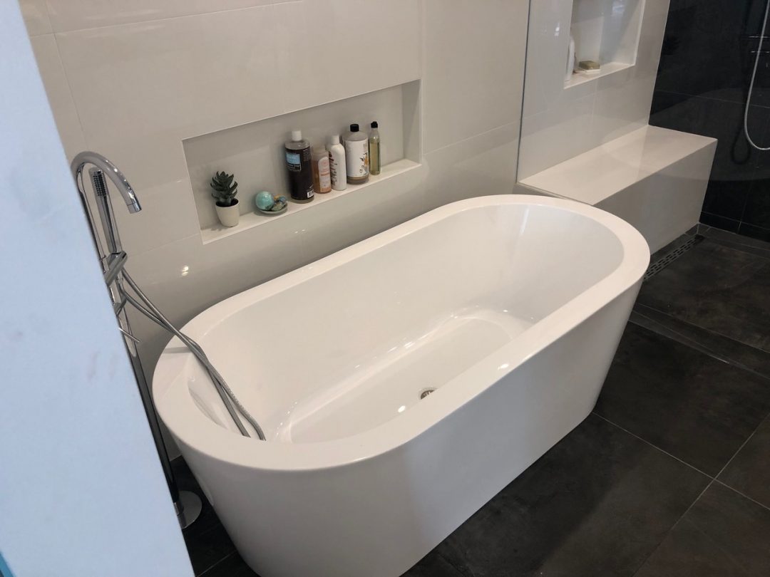 built in shelves over the tub | Eden Builders